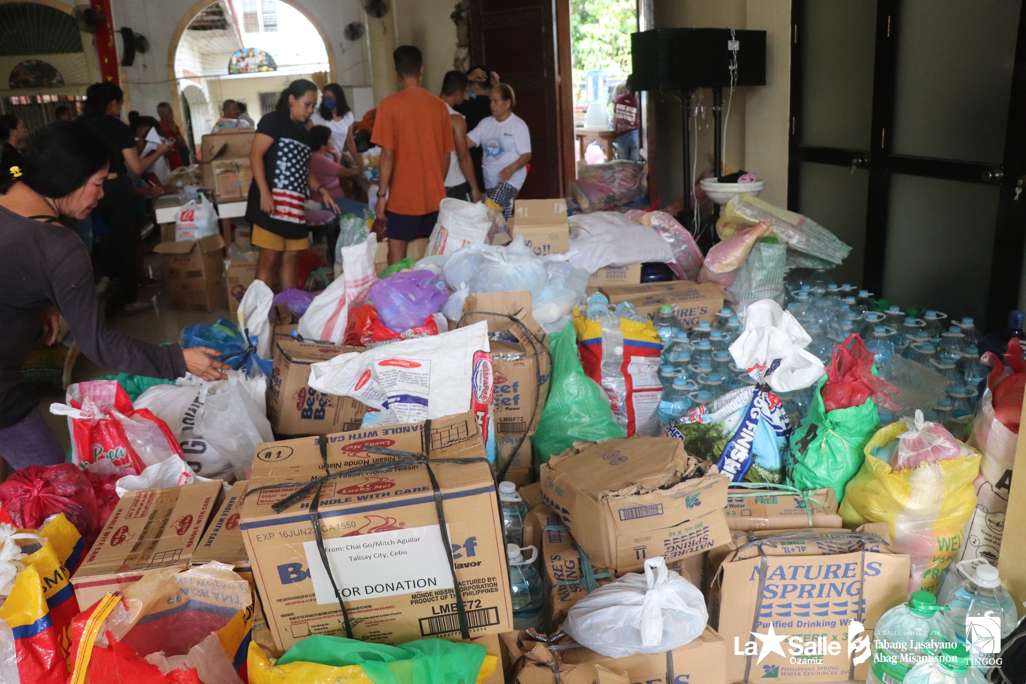 LSU Volunteers deliver Animo Care Packages to Evacuees | LSU